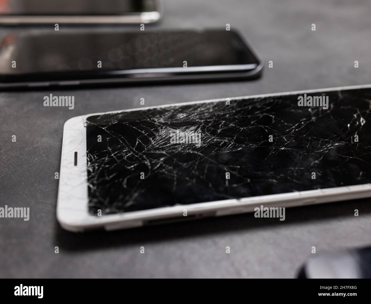 Broken mobile phone screen, black, white, clipping path. Smartphone ...