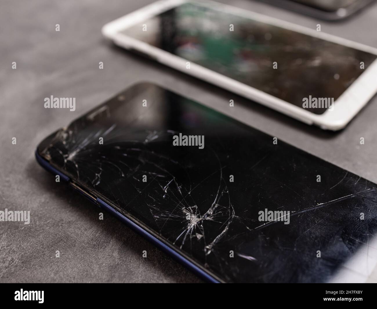 Broken mobile phone screen, black, white, clipping path. Smartphone ...
