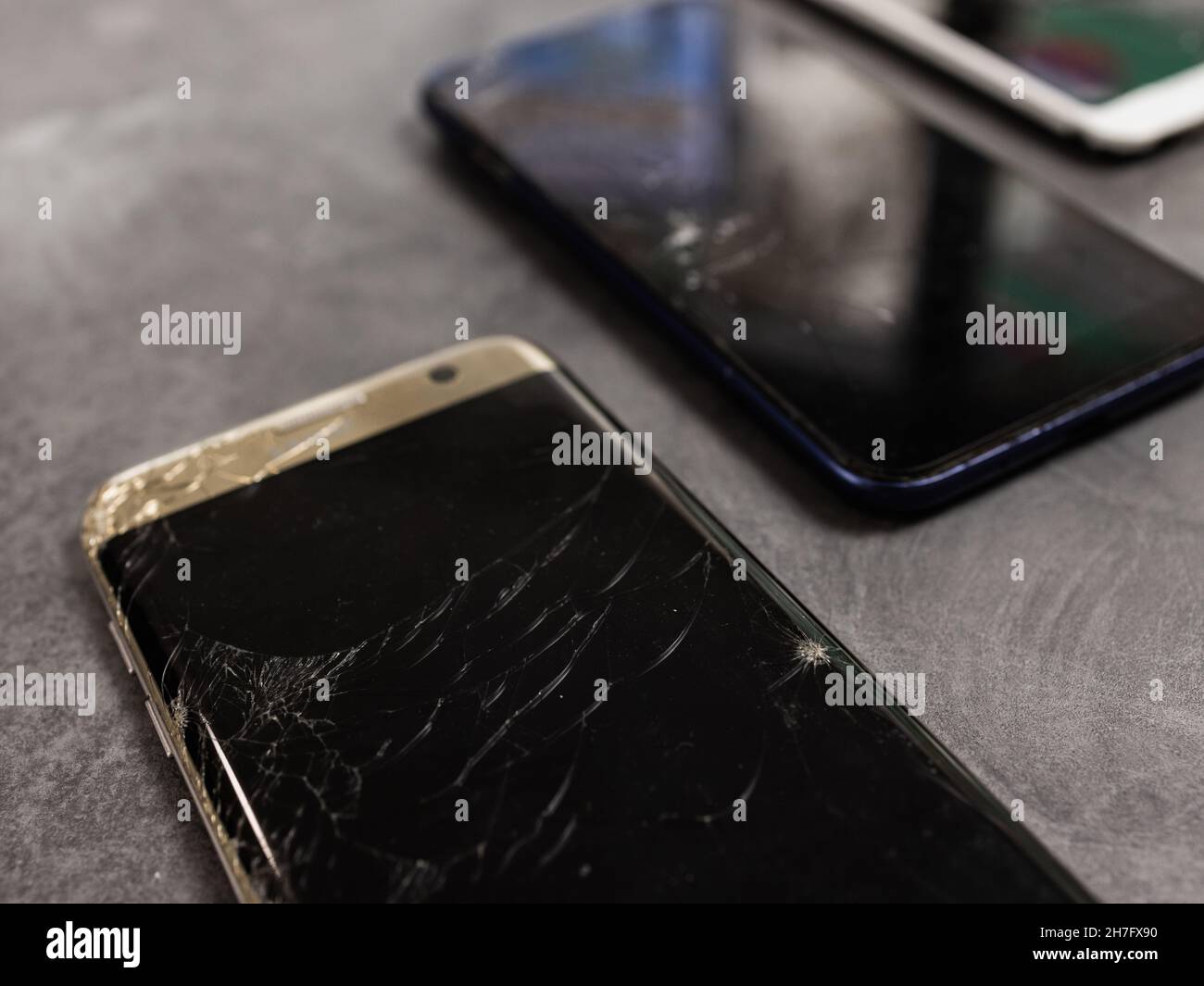 Broken mobile phone screen, black, white, clipping path. Smartphone ...