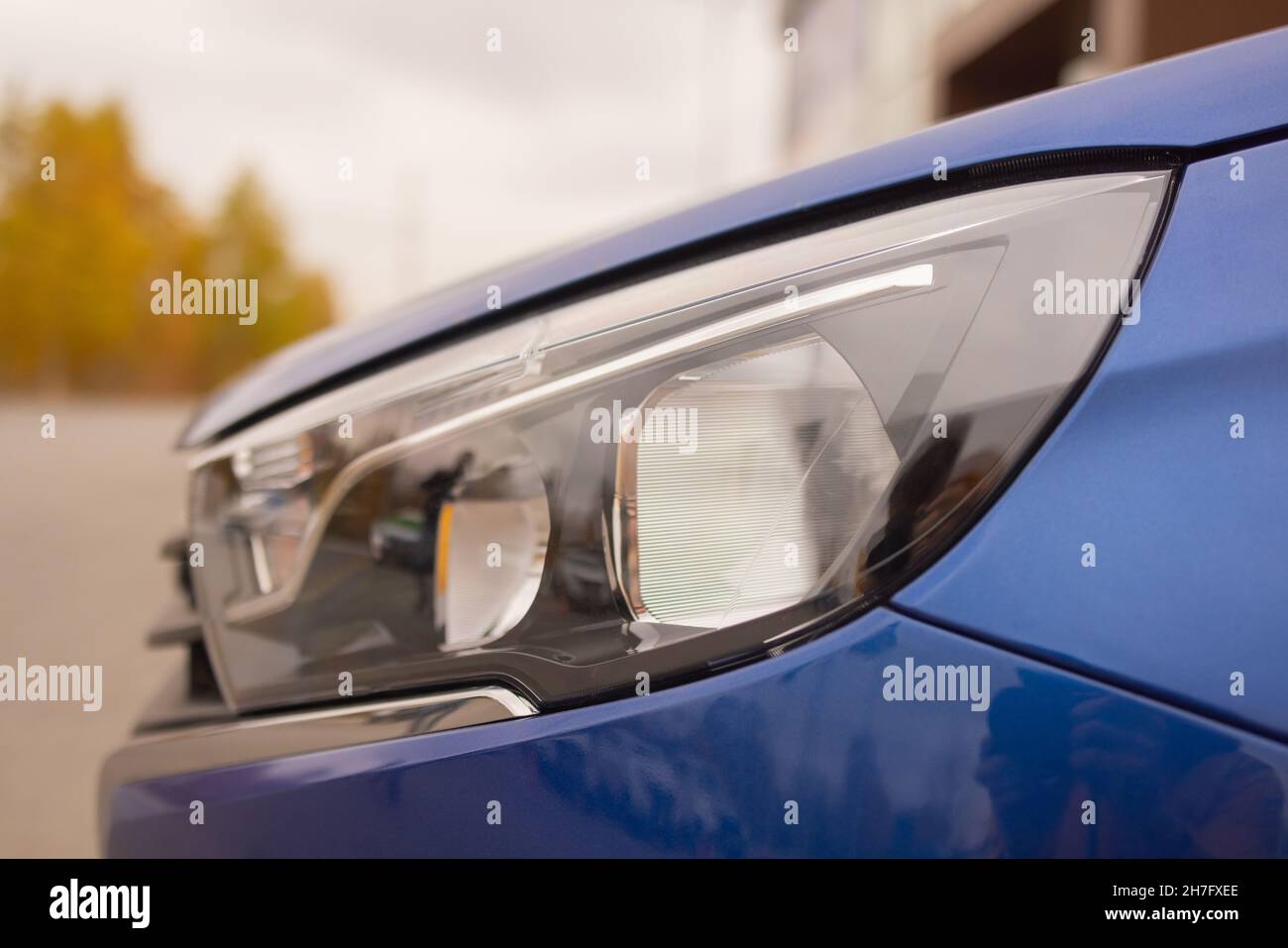 modern car in reflections on blue metallic Stock Photo - Alamy