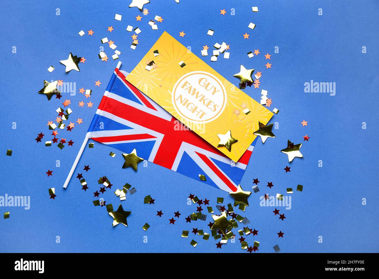 Greeting card for Guy Fawkes night, flag of Great Britain and confetti ...