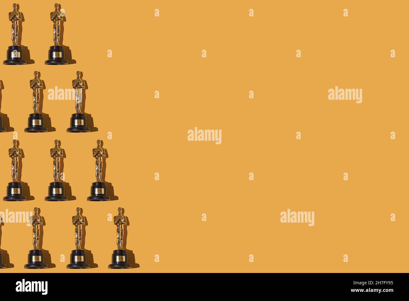 Oscar awards trophy pattern, on the left side with copy space, on ...