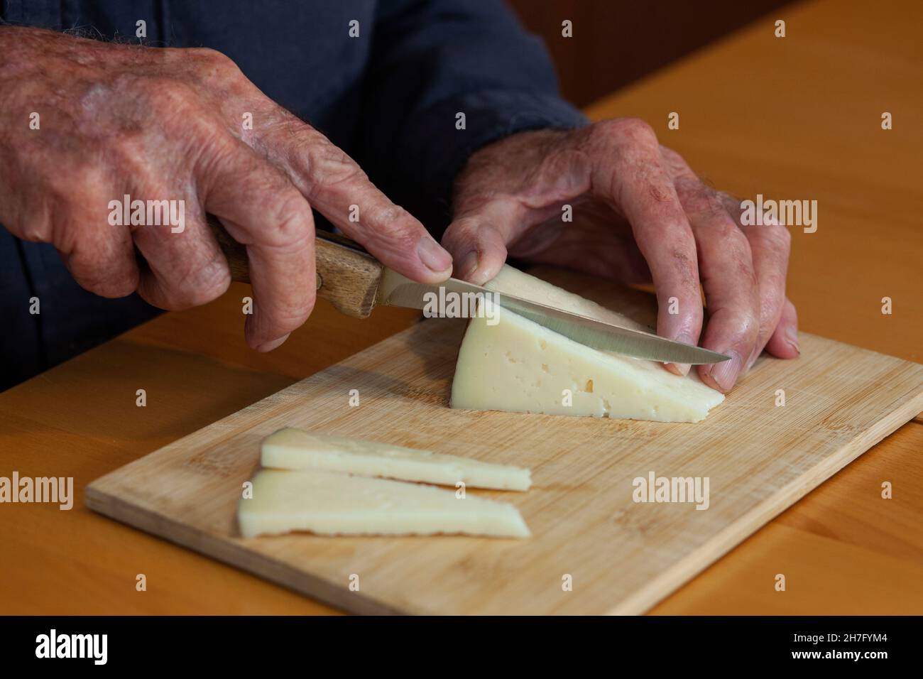 Grandfather cutting hi-res stock photography and images - Alamy