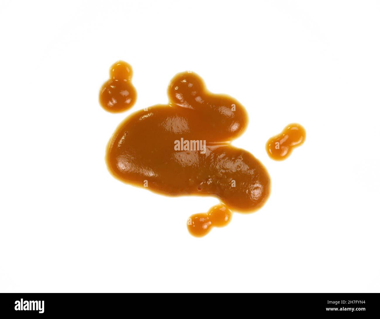 Baby fruit puree spilled on white background. Baby fruit puddle ...