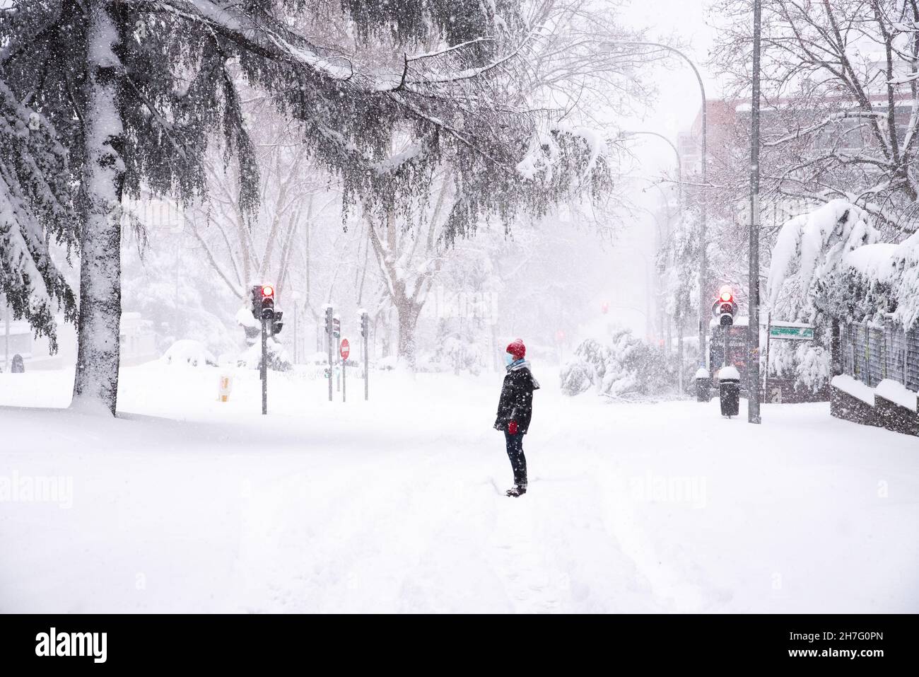 People walking on a street during heavy snow storm Stock Photo - Alamy