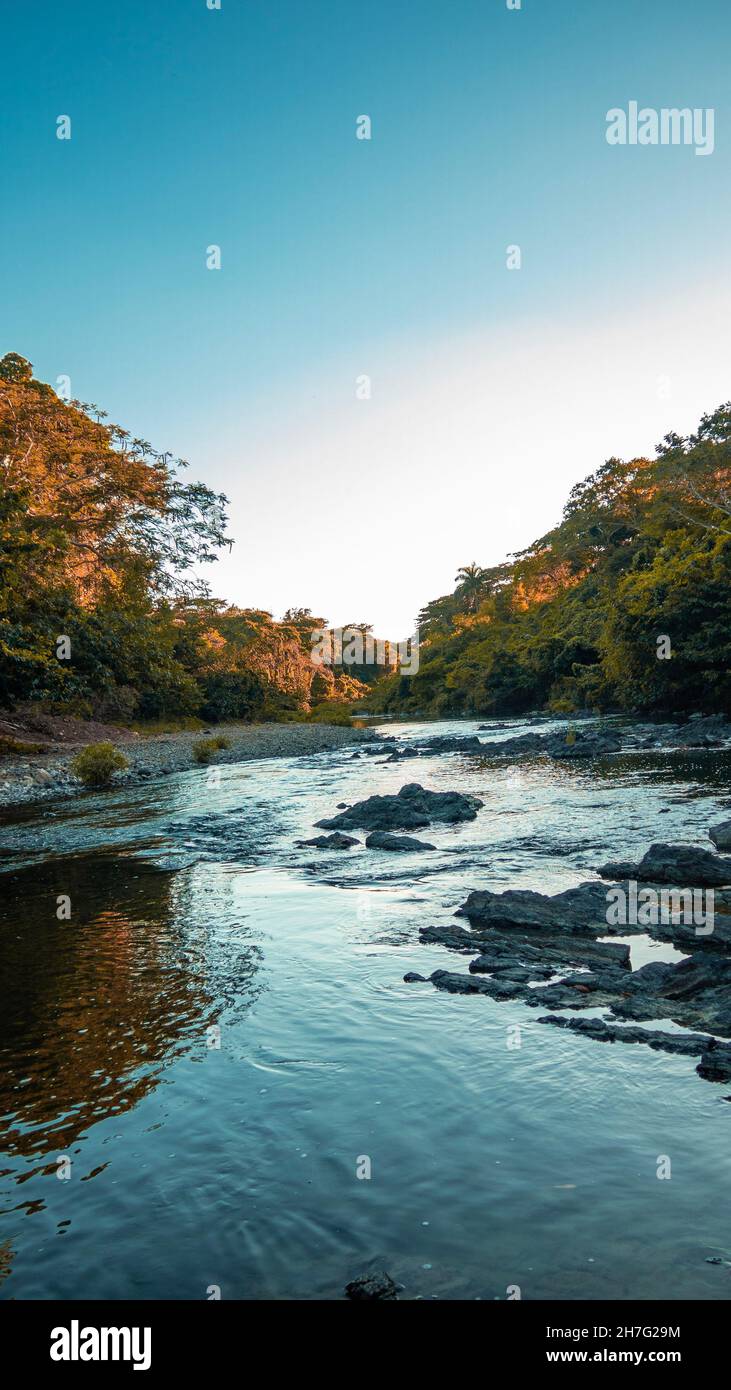 the beautiful nature in a calm afternoon between the mountains and the ...