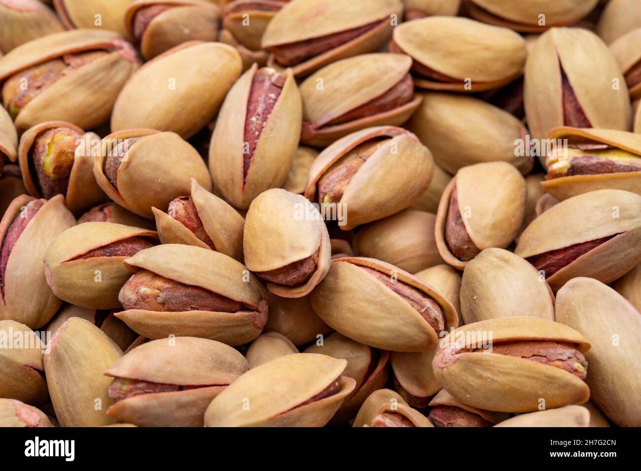 Close-up pistachios. food background. Snack Fresh Nuts Stock Photo - Alamy