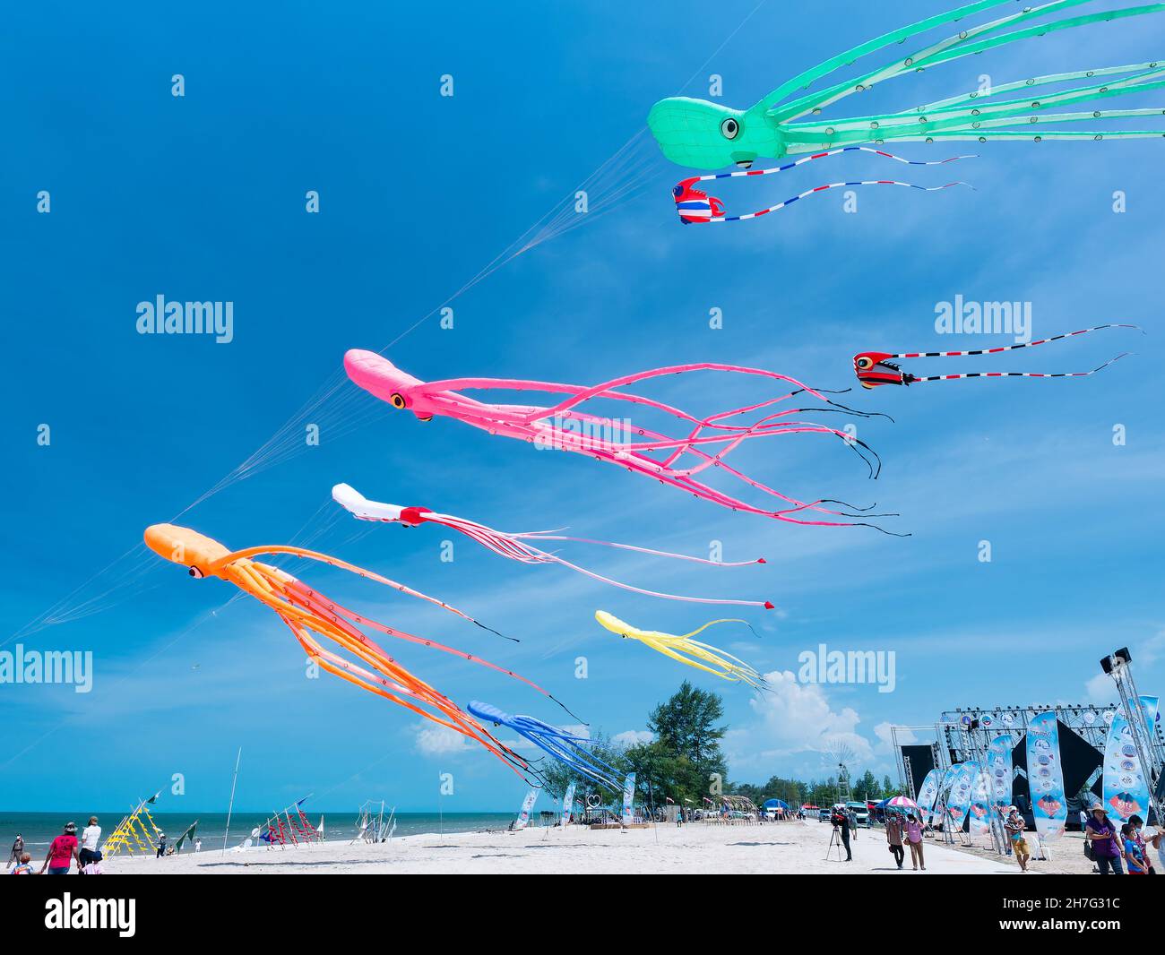 Flying white kite in blue sky with clouds hi-res stock photography and ...