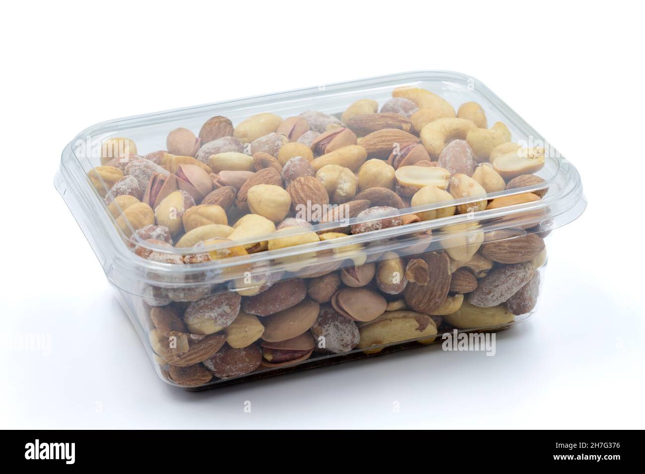 Packed Mixed nuts isolated on white background. Snack nuts. close-up ...