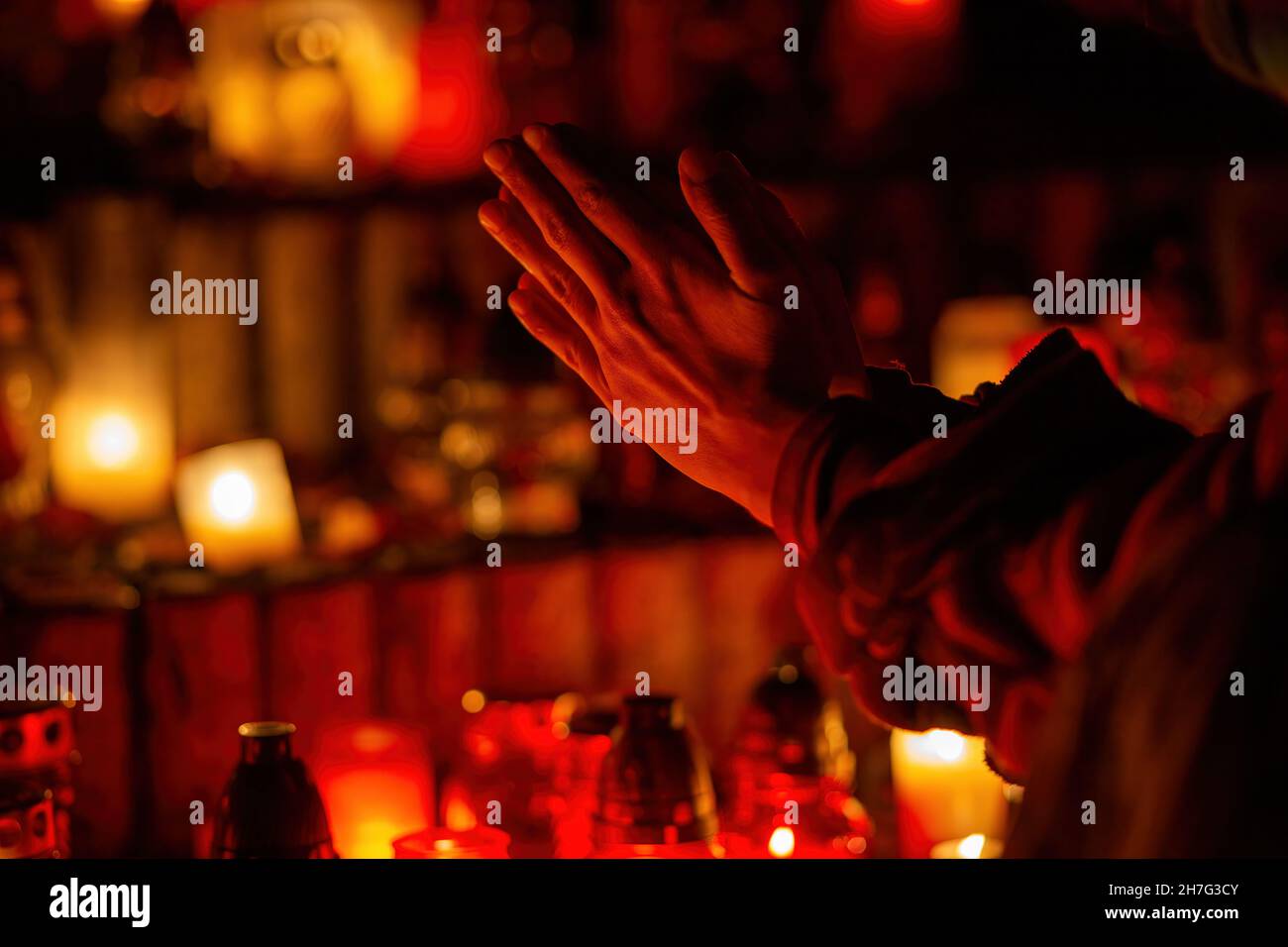 prayer hands. Candles in the cemetery. 1st November. Feast of All ...
