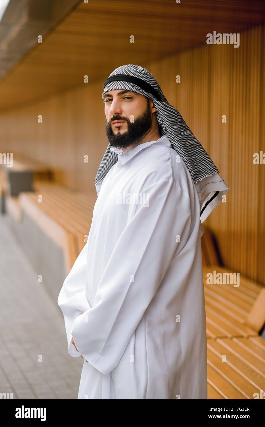 Middle eastern young man in traditional clothing Stock Photo - Alamy