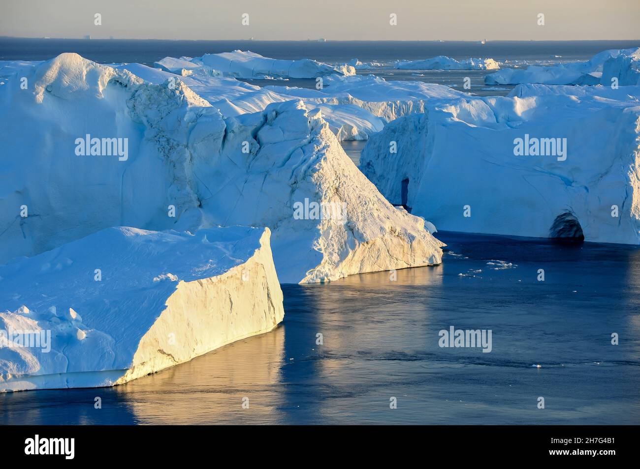 DENMARK. GREENLAND. WEST COAST. THE FJORD FULL OF ICEBERGS COMING FROM ...