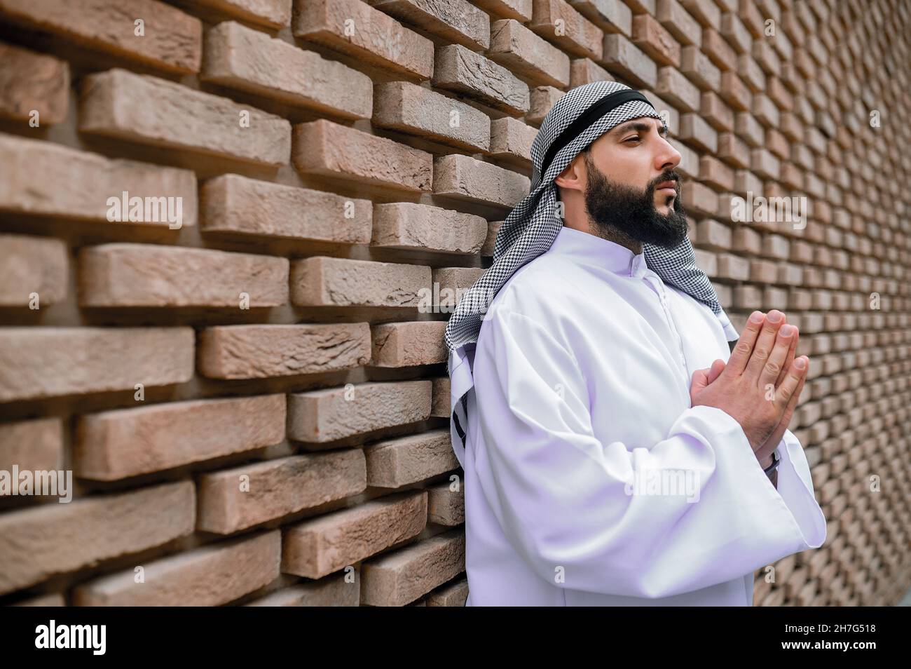 White muslim man praying in hi-res stock photography and images - Alamy
