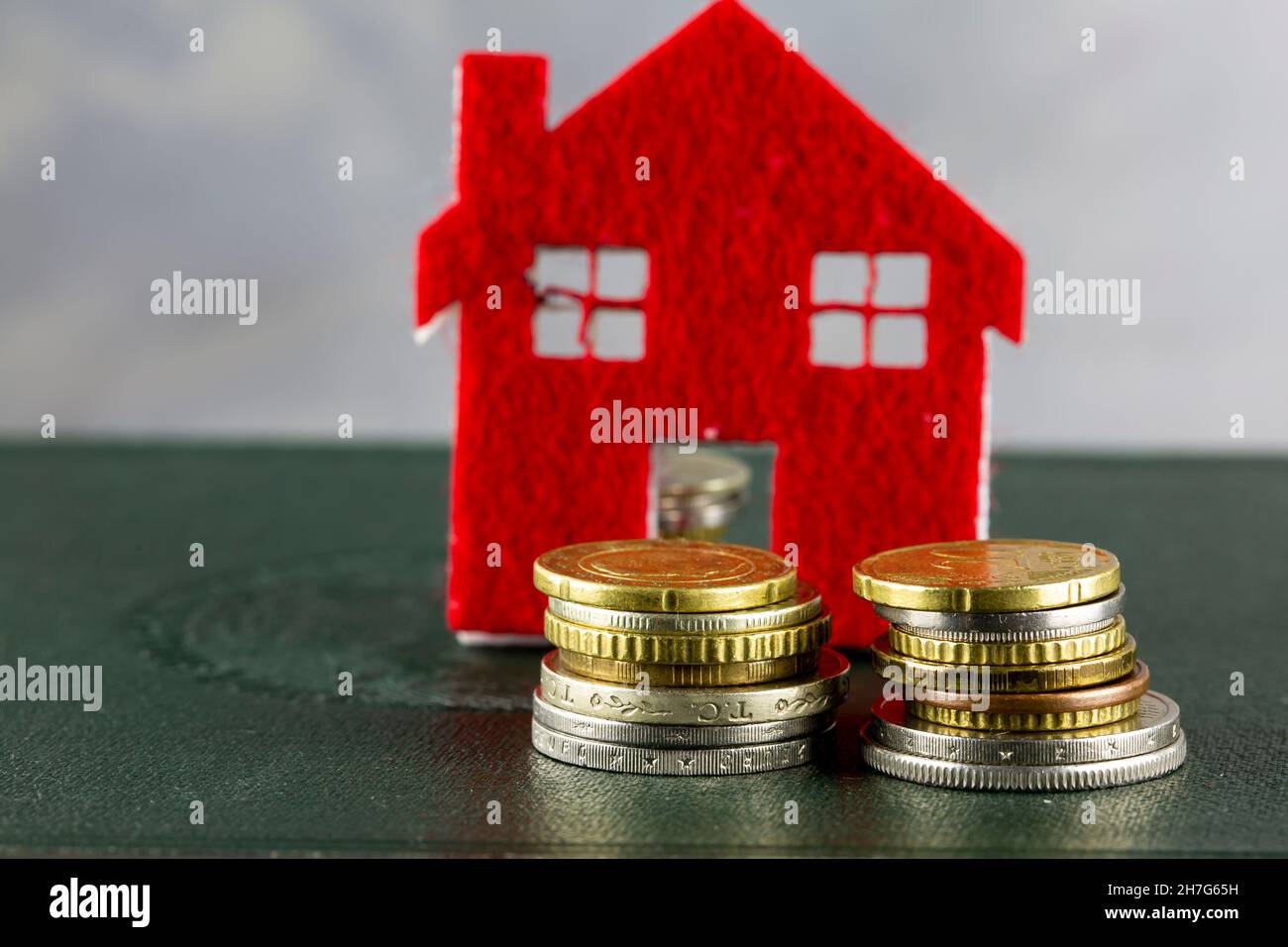 House and money pillars, new house consept Stock Photo - Alamy