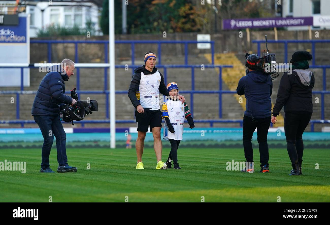 Kevin Sinfield walks into Headingley Stadum with Macy Burrow (Rob ...