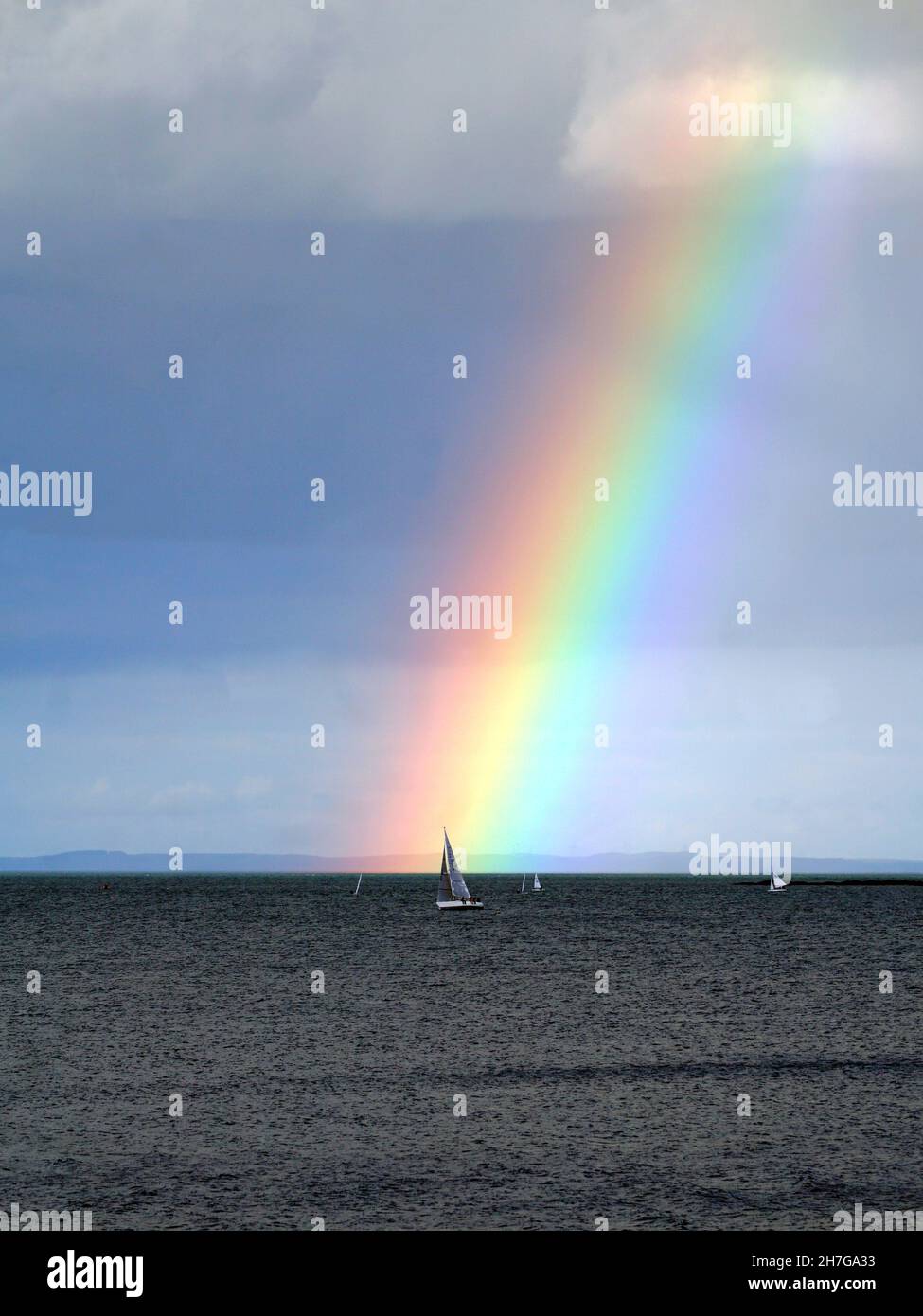 Sailboats and beautiful rainbow over the Irish Sea Stock Photo - Alamy