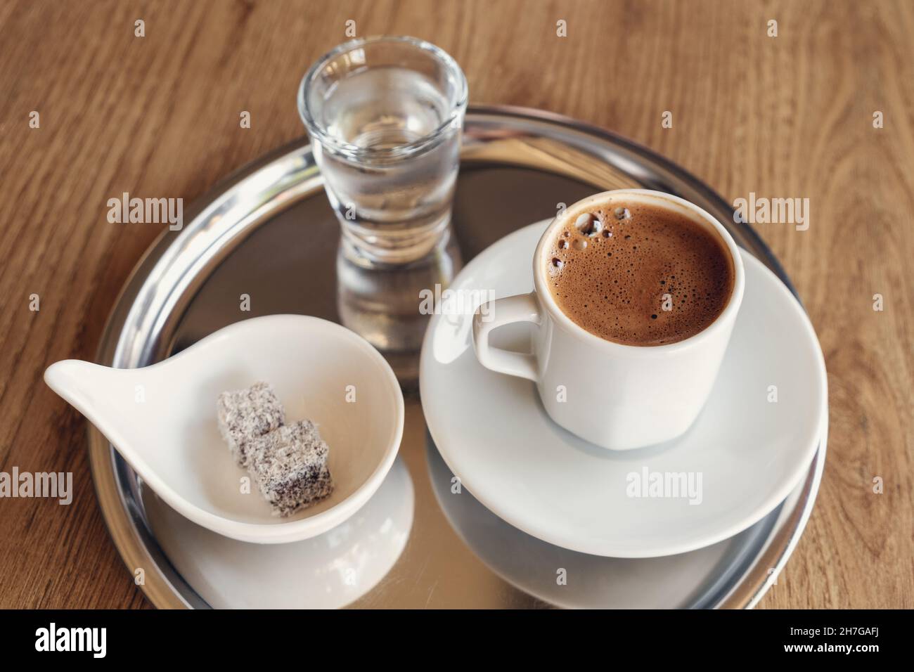 Traditional Turkish coffee with cold water and Turkish delight - Image ...