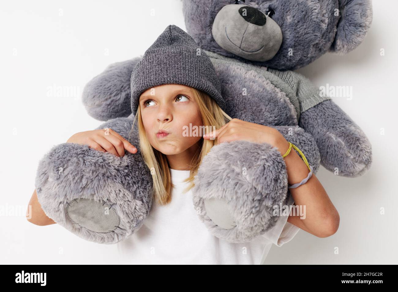 happy cute girl fashionable baby clothes on a light background Stock ...