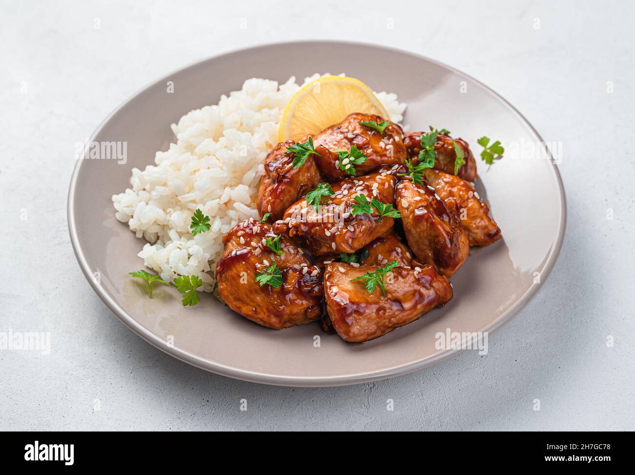 Chicken teriyaki with rice is a traditional Japanese dish Stock Photo ...