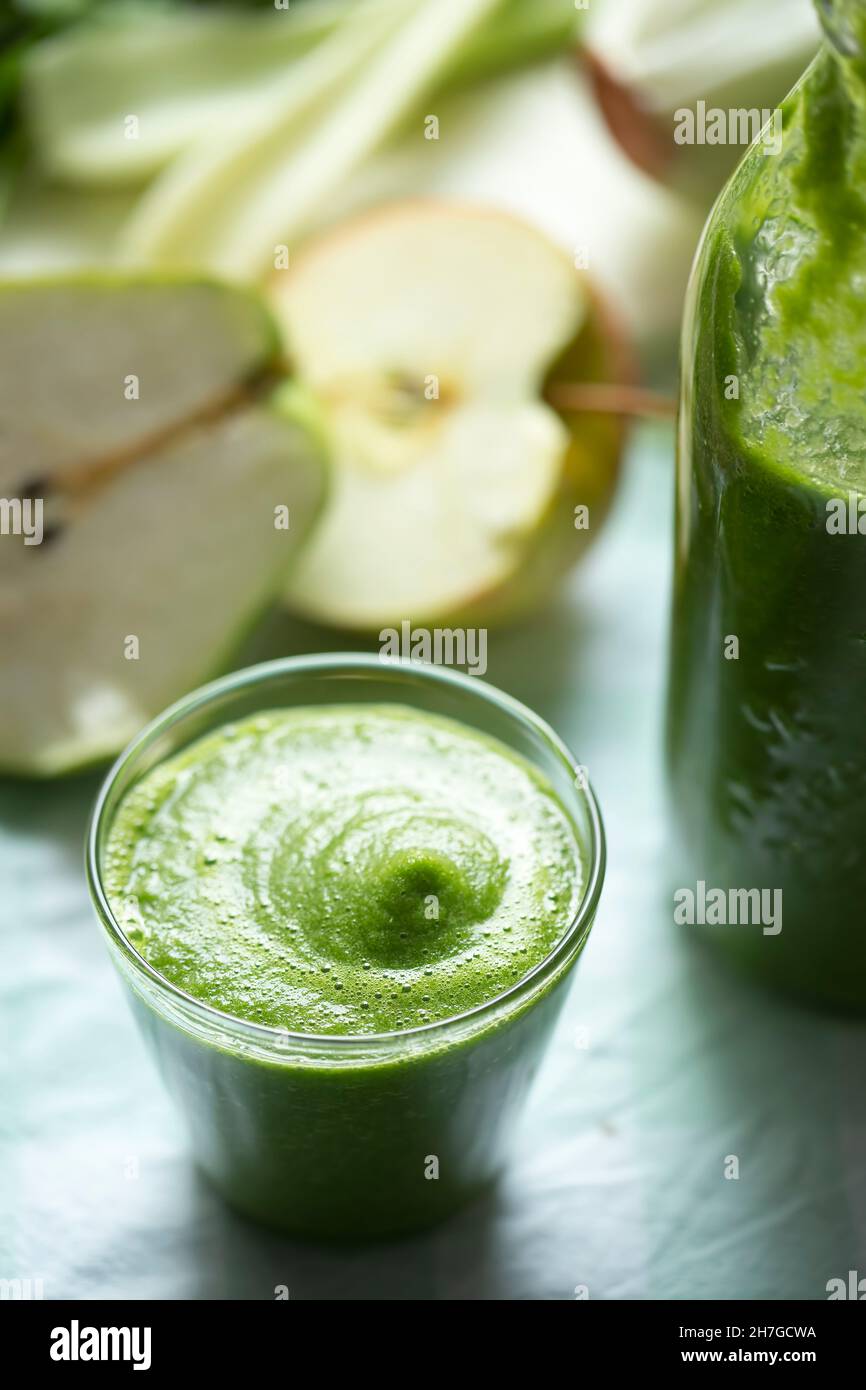 Green healthy cocktail, smoothie. With pear, apple, celery, cabbage ...