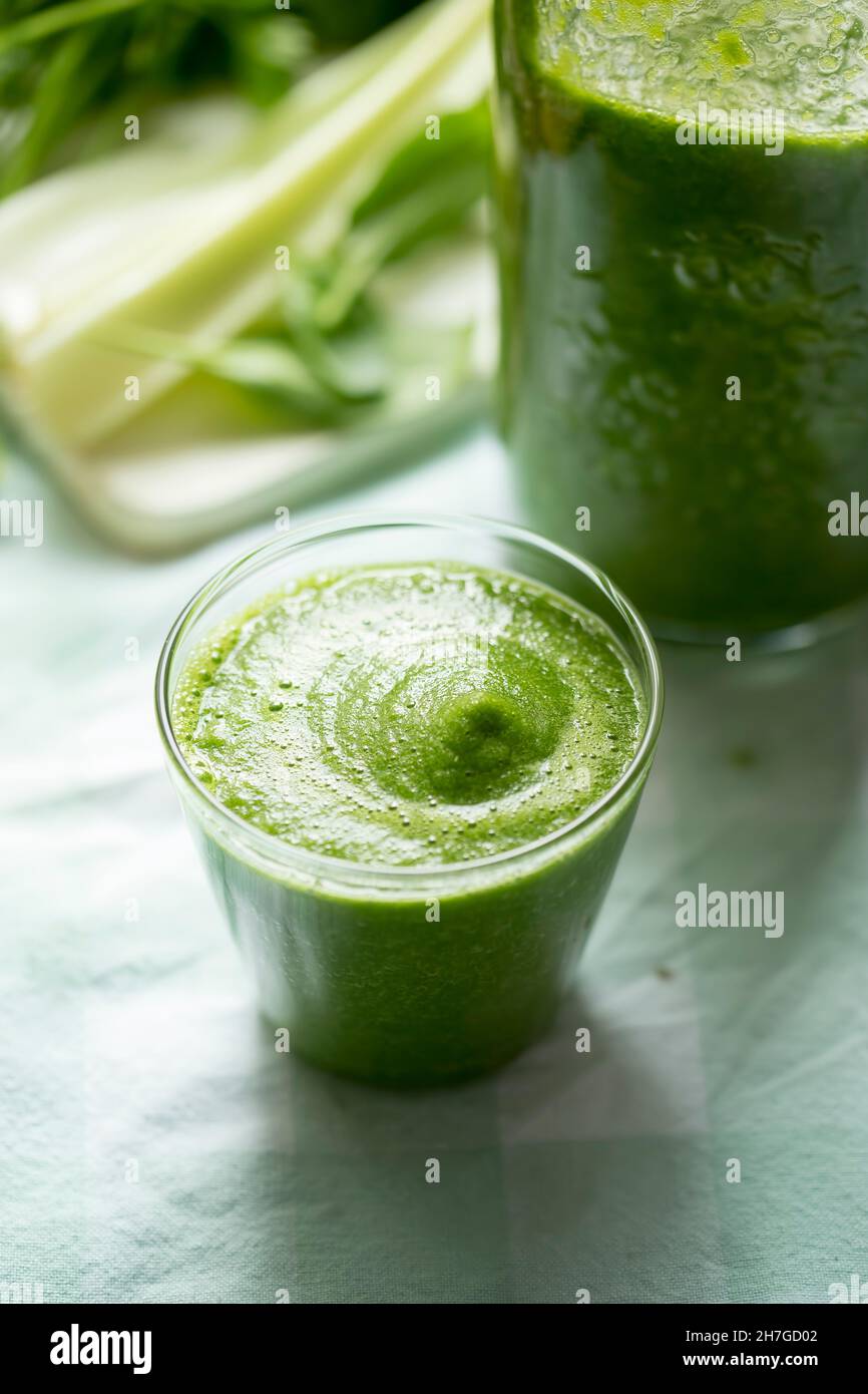Green healthy cocktail, smoothie. With pear, apple, celery, cabbage ...