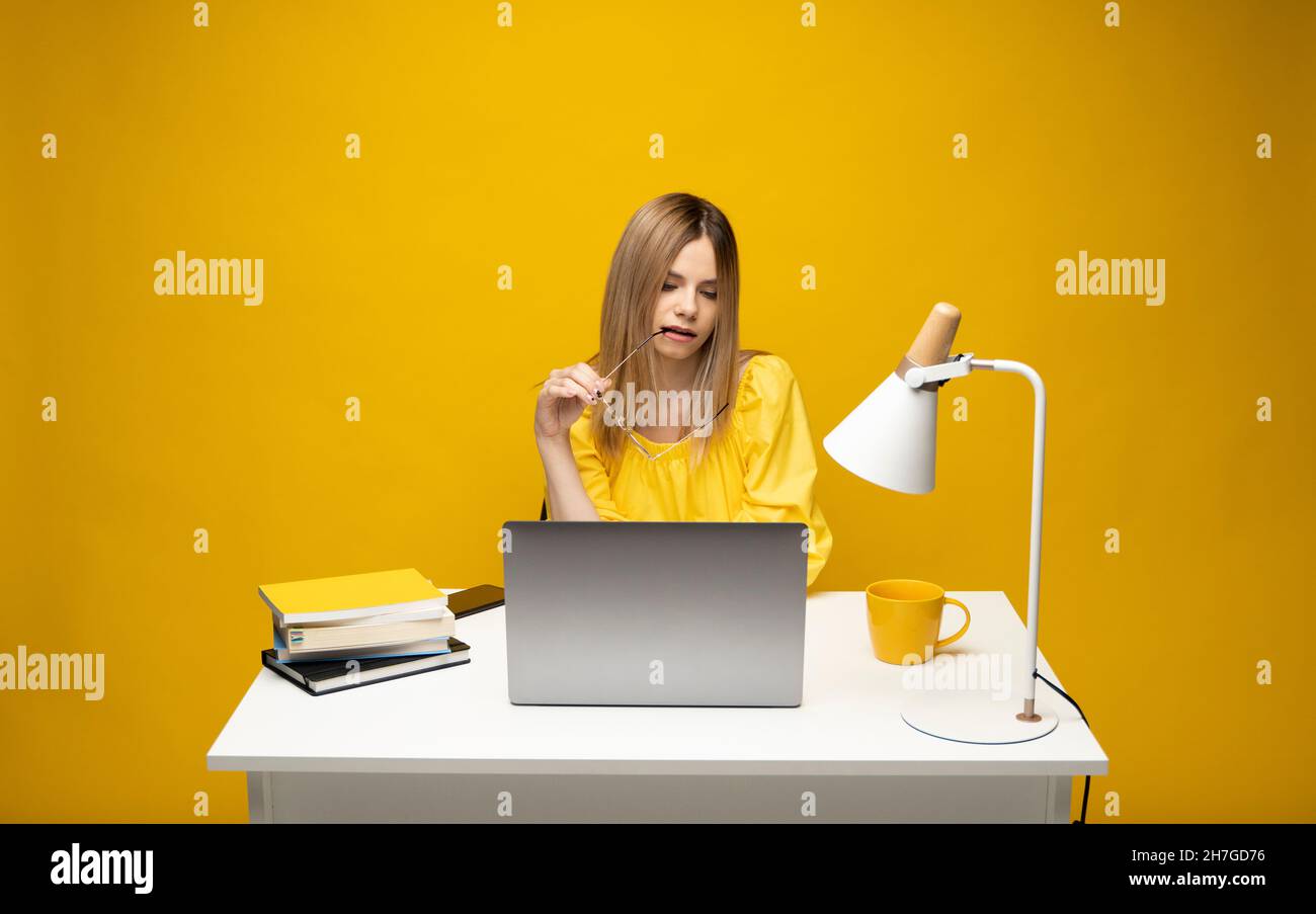 Studio portrait of young successful secretary employee business woman ...