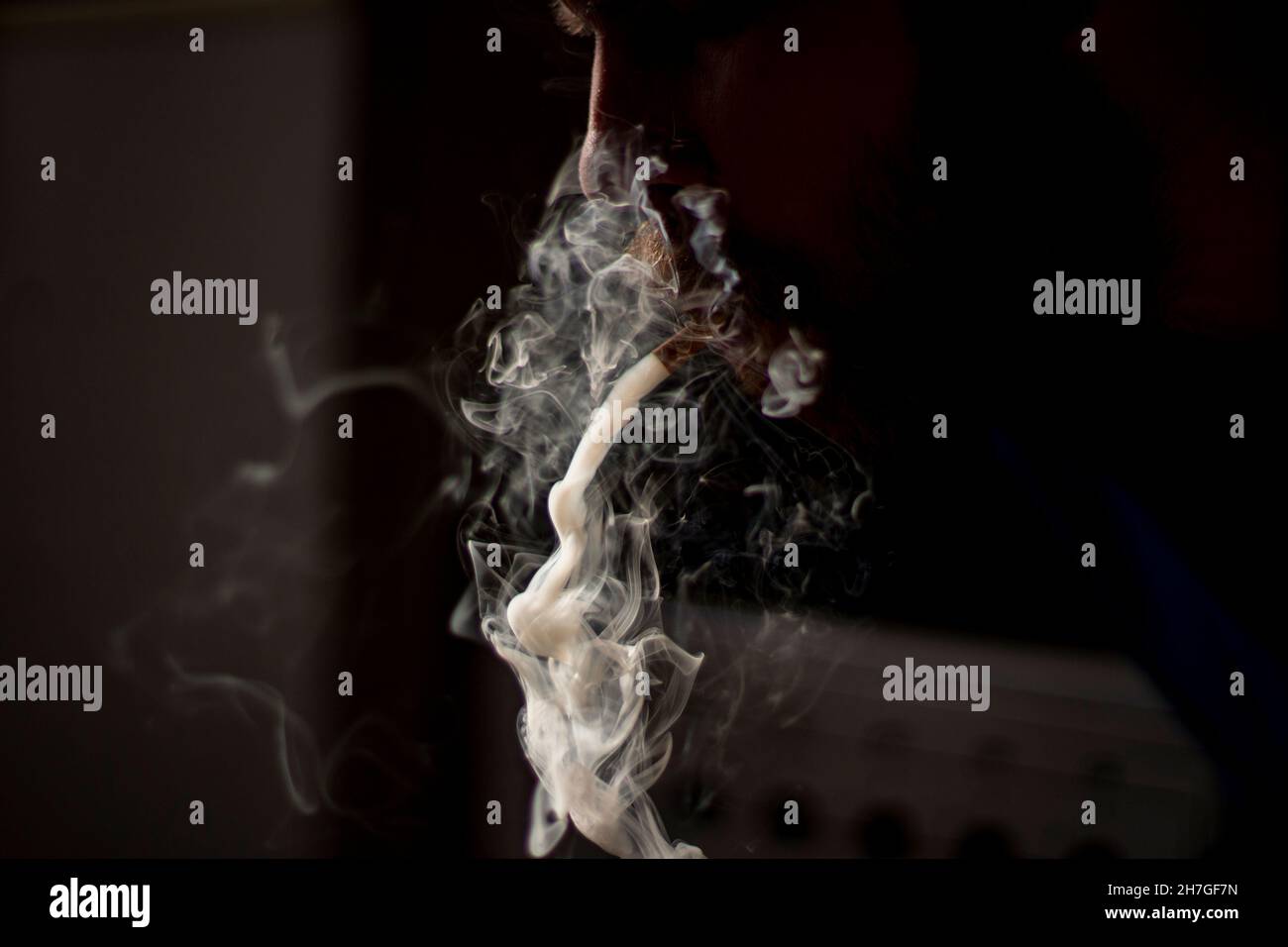Smoke in natural light. Tobacco smoke fills the air. Clubs of steam in ...