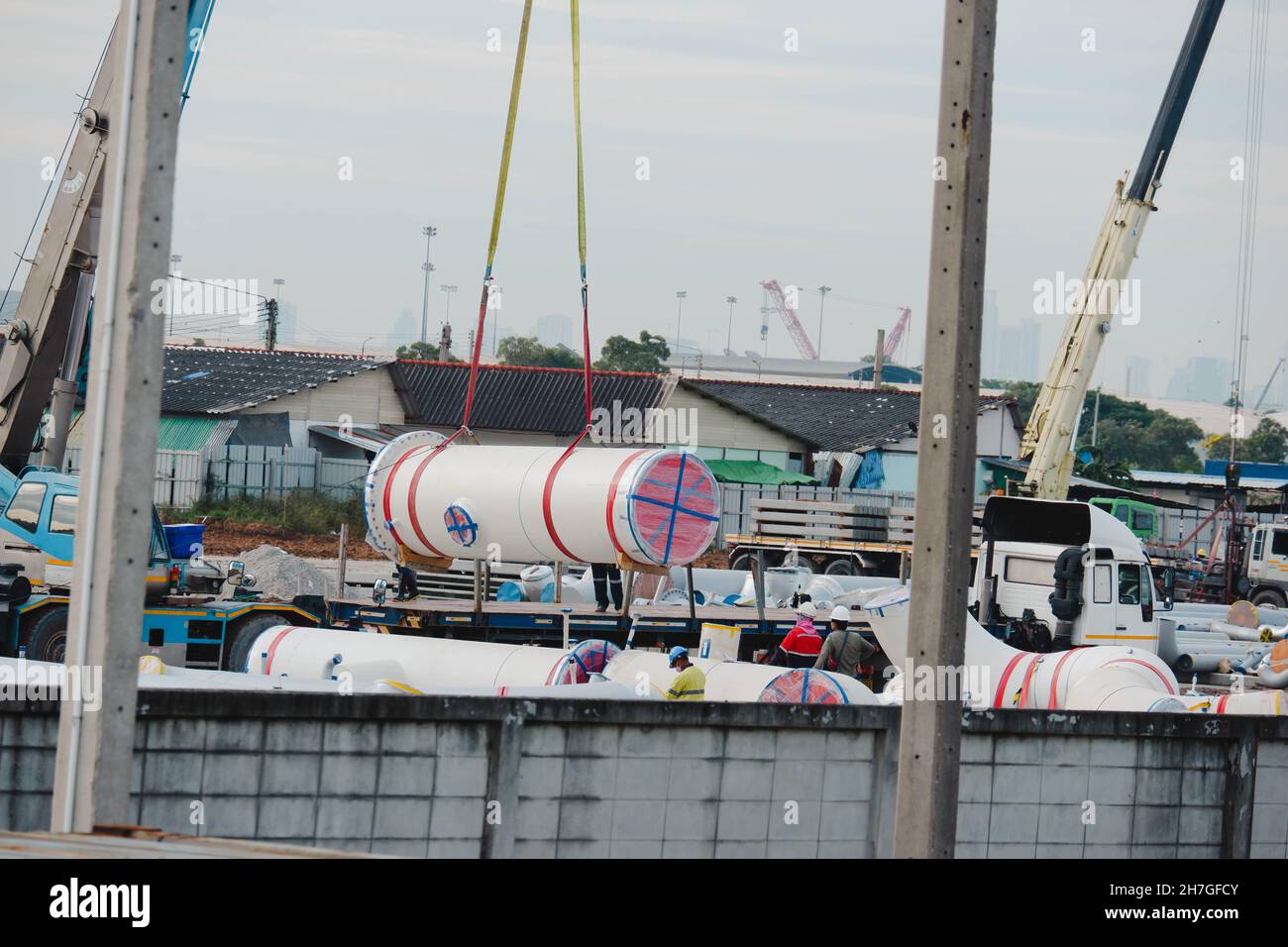 moving large water pipe for assembly Stock Photo - Alamy