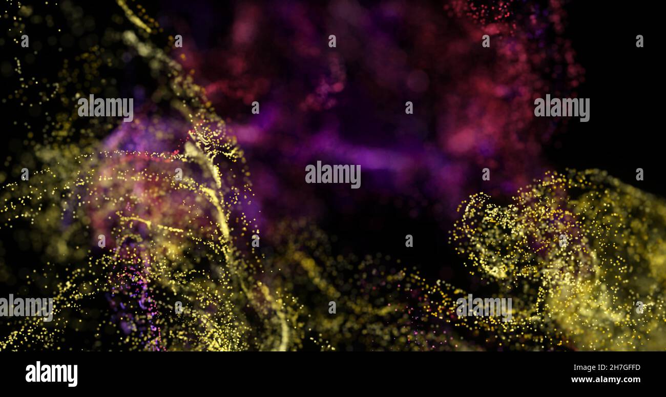Image of pink and yellow particle clouds moving on black background ...
