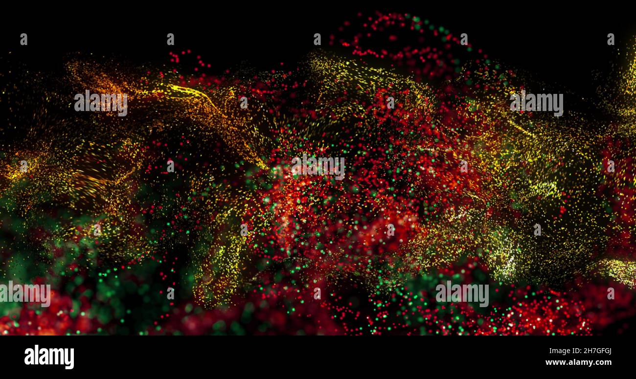Image of red, yellow and blue particle cloud moving on black background ...