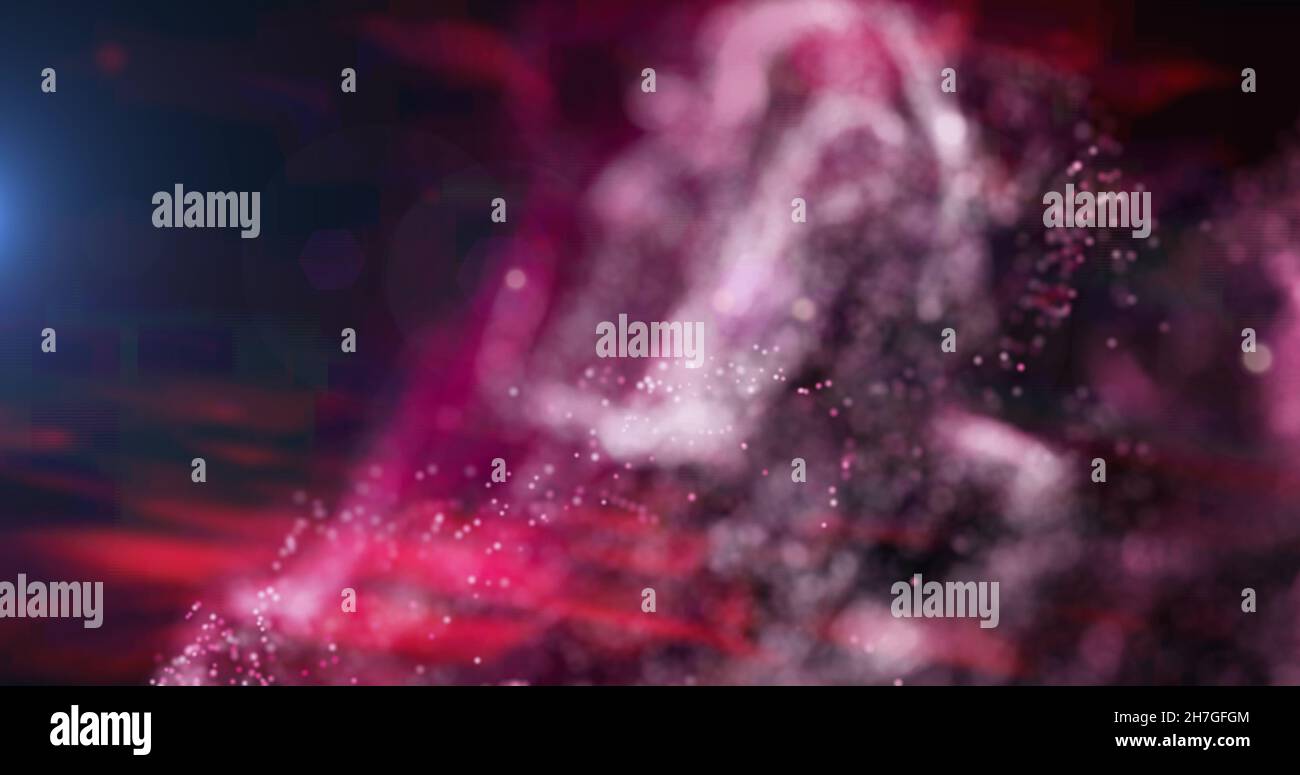 Image of red and pink particle clouds moving on black background Stock ...