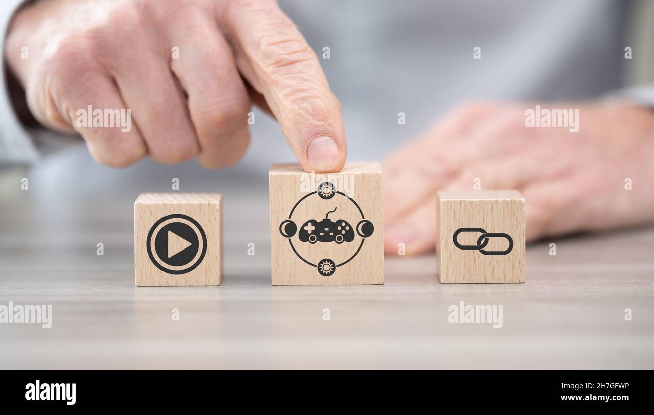 Wooden blocks with symbol of video game addiction concept Stock Photo ...