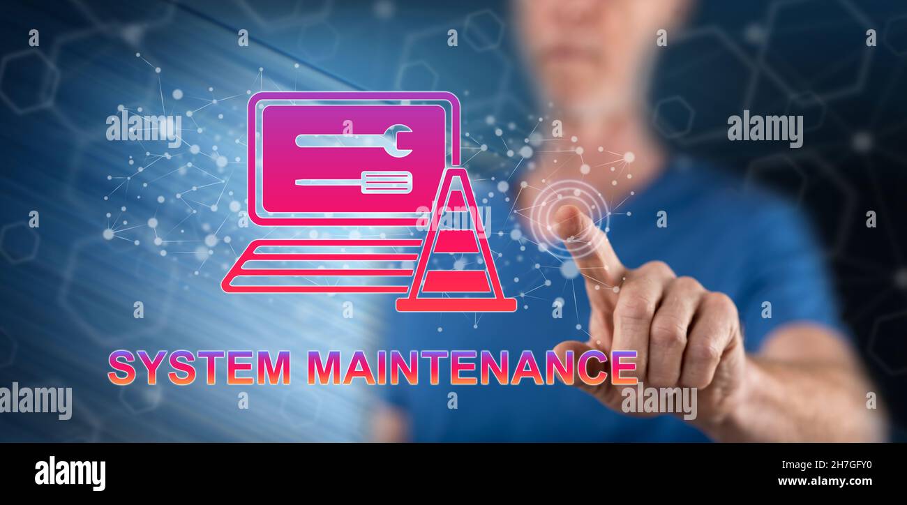 Man touching a system maintenance concept on a touch screen with his ...