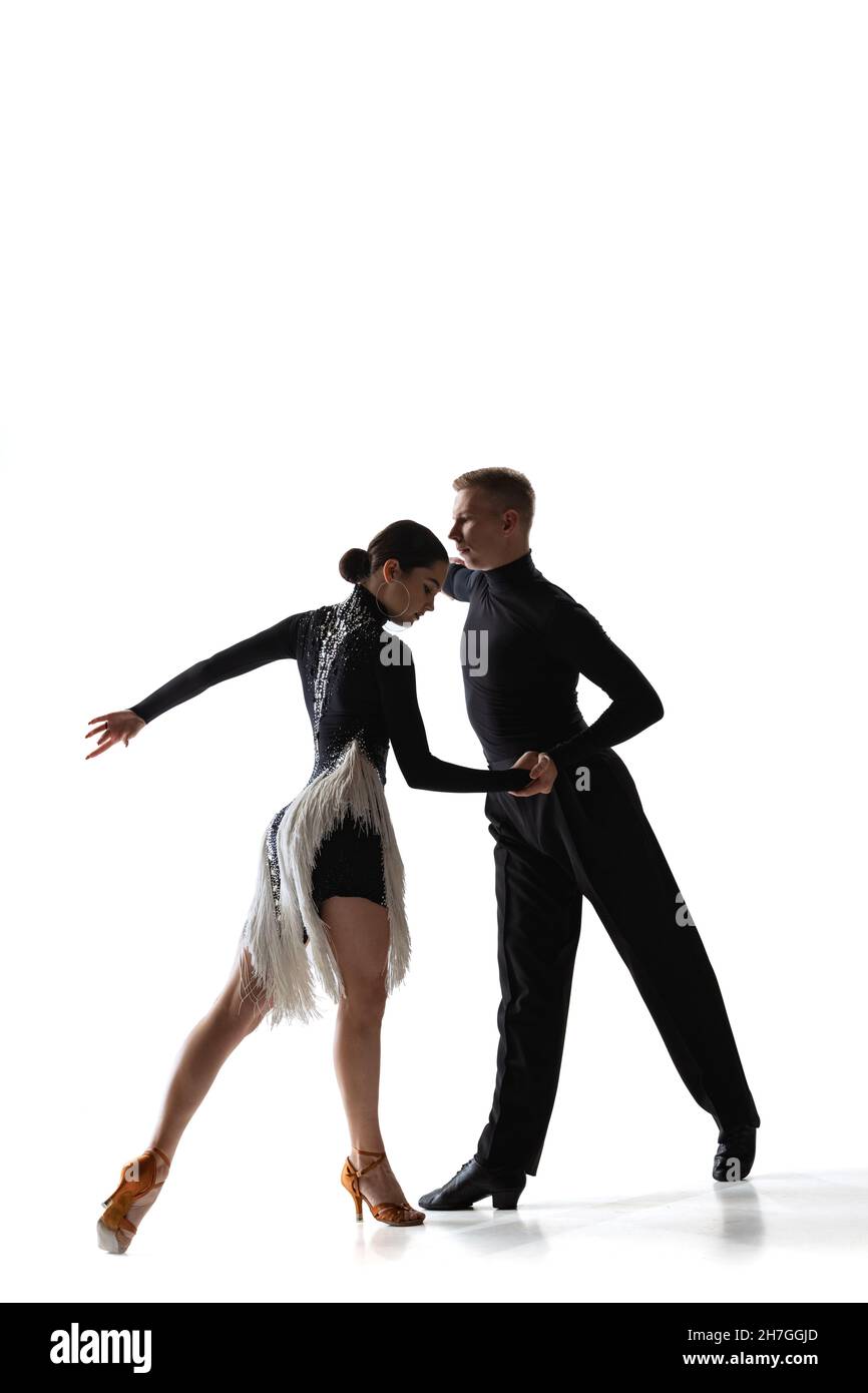 Dynamic portrait of young graceful dancers, flexible man and woman ...