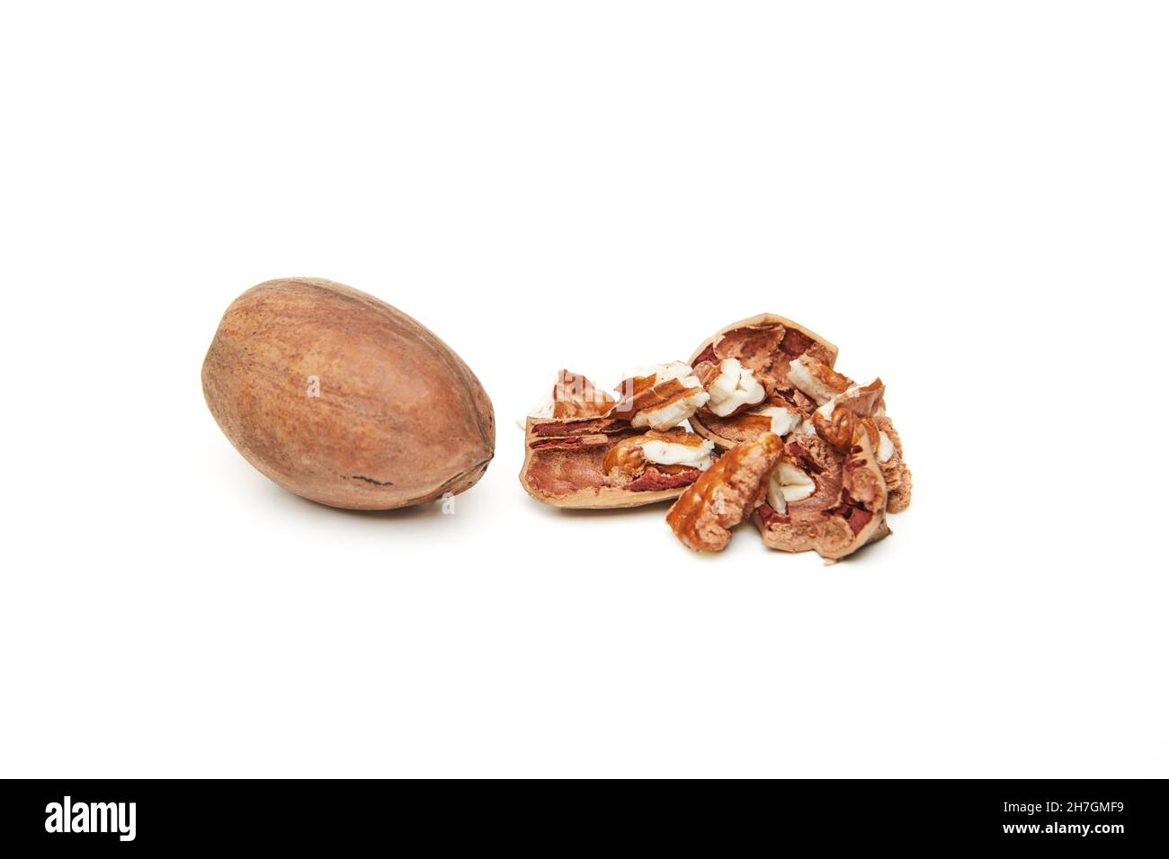 Pecans, whole and uncovered isolated on white background Stock Photo ...