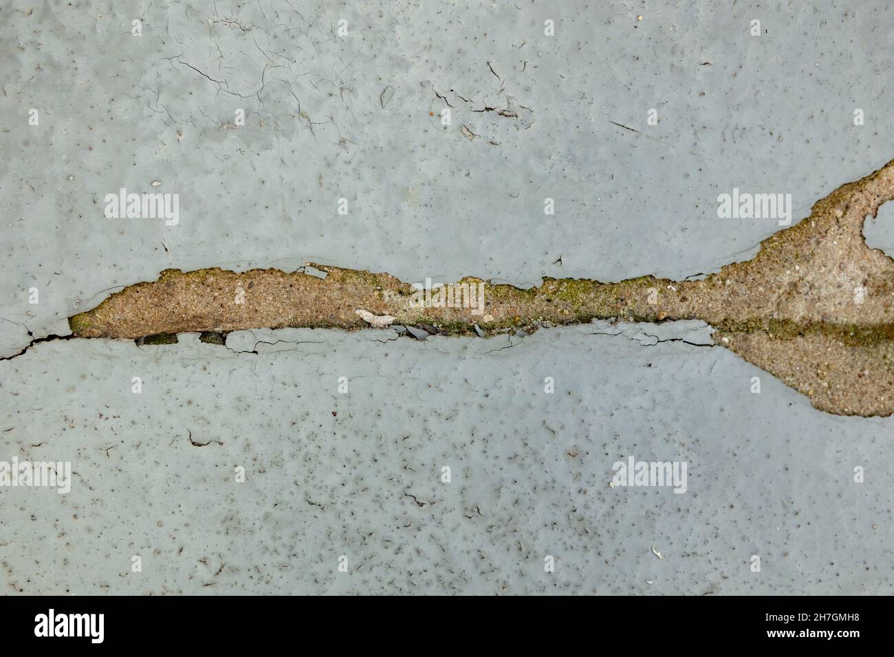 Abstract damaged grey wall with chipped paint on the surface Stock ...