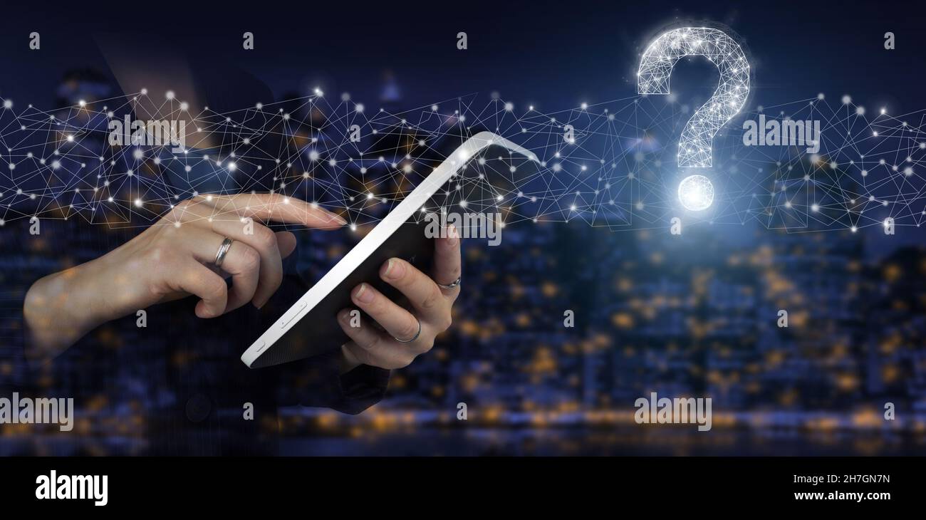 FAQ Concept image.Find answer online. Hand touch white tablet with ...