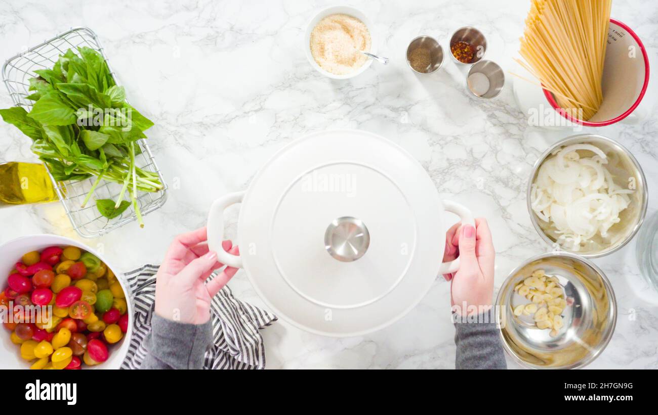 Flat lay. Step by step. Cooking on pot pasta recipe in an enameled cast ...