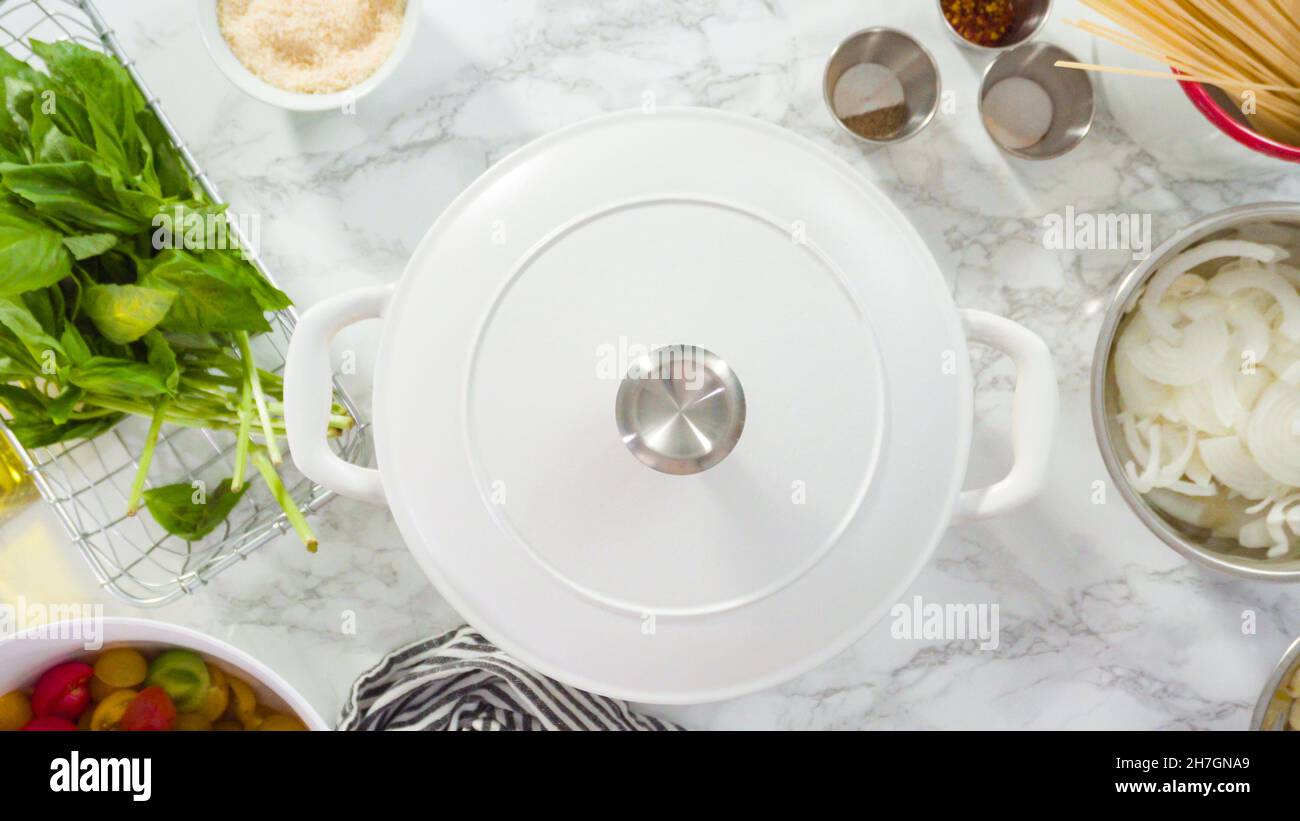 Flat lay. Step by step. Cooking on pot pasta recipe in an enameled cast ...