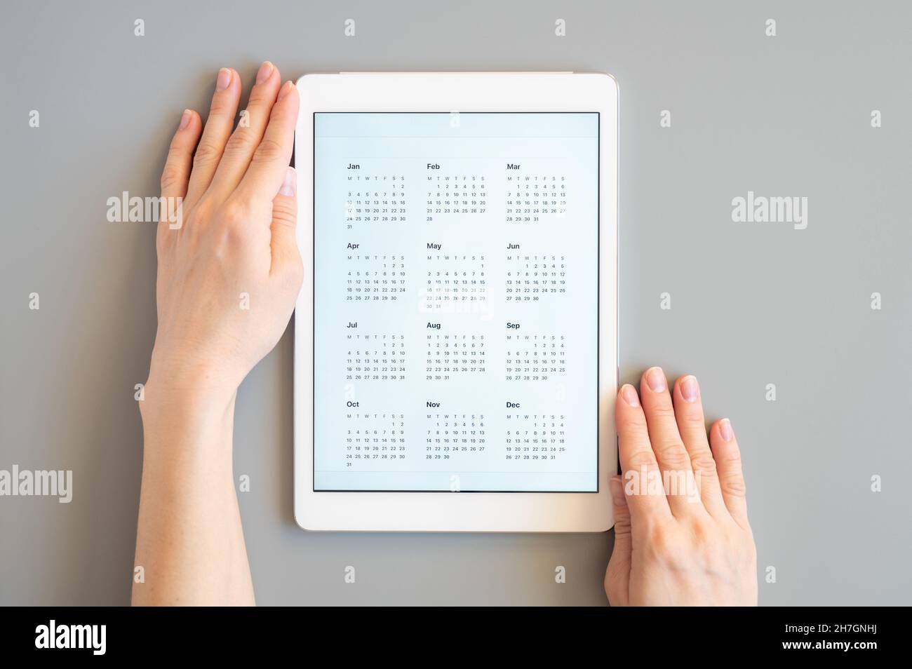 tablet computer with an open app of calendar for unspecified unknown ...