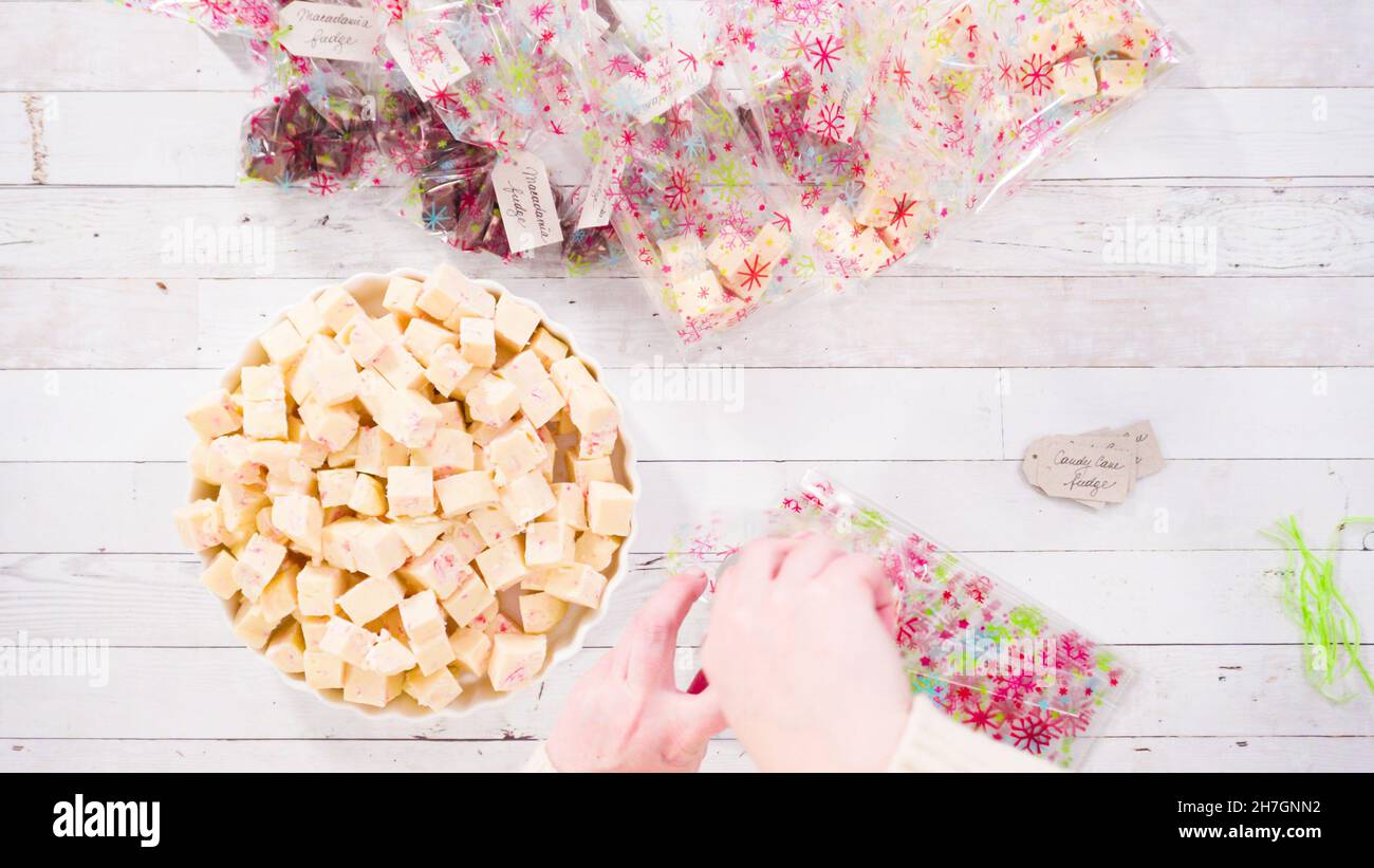 Flat lay. Step by step. Packaging homemade candy cane fudge into small ...