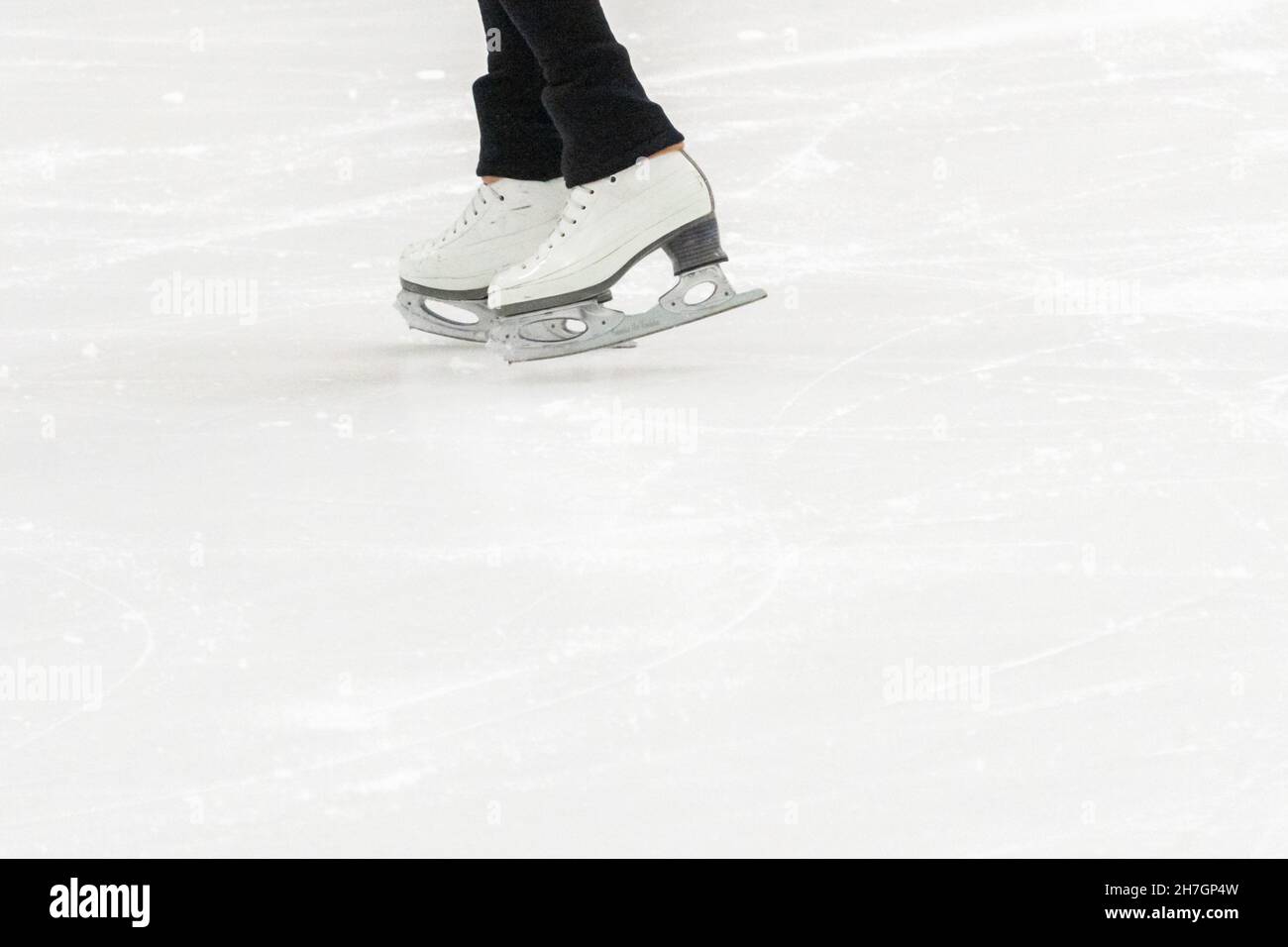 View of figure skater feet at the figure skating practice Stock Photo ...