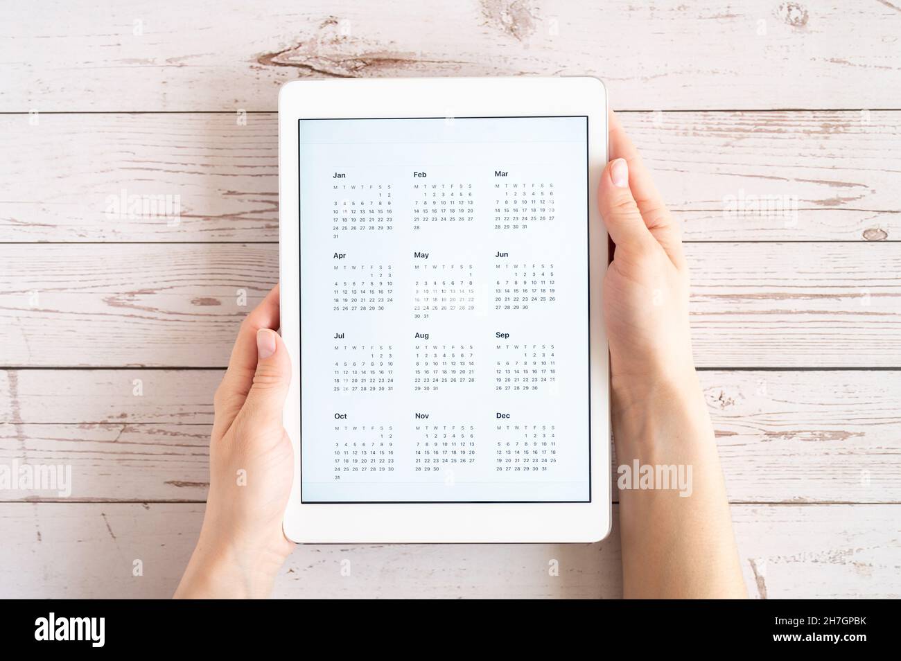 tablet computer with an open app of calendar for unspecified unknown ...