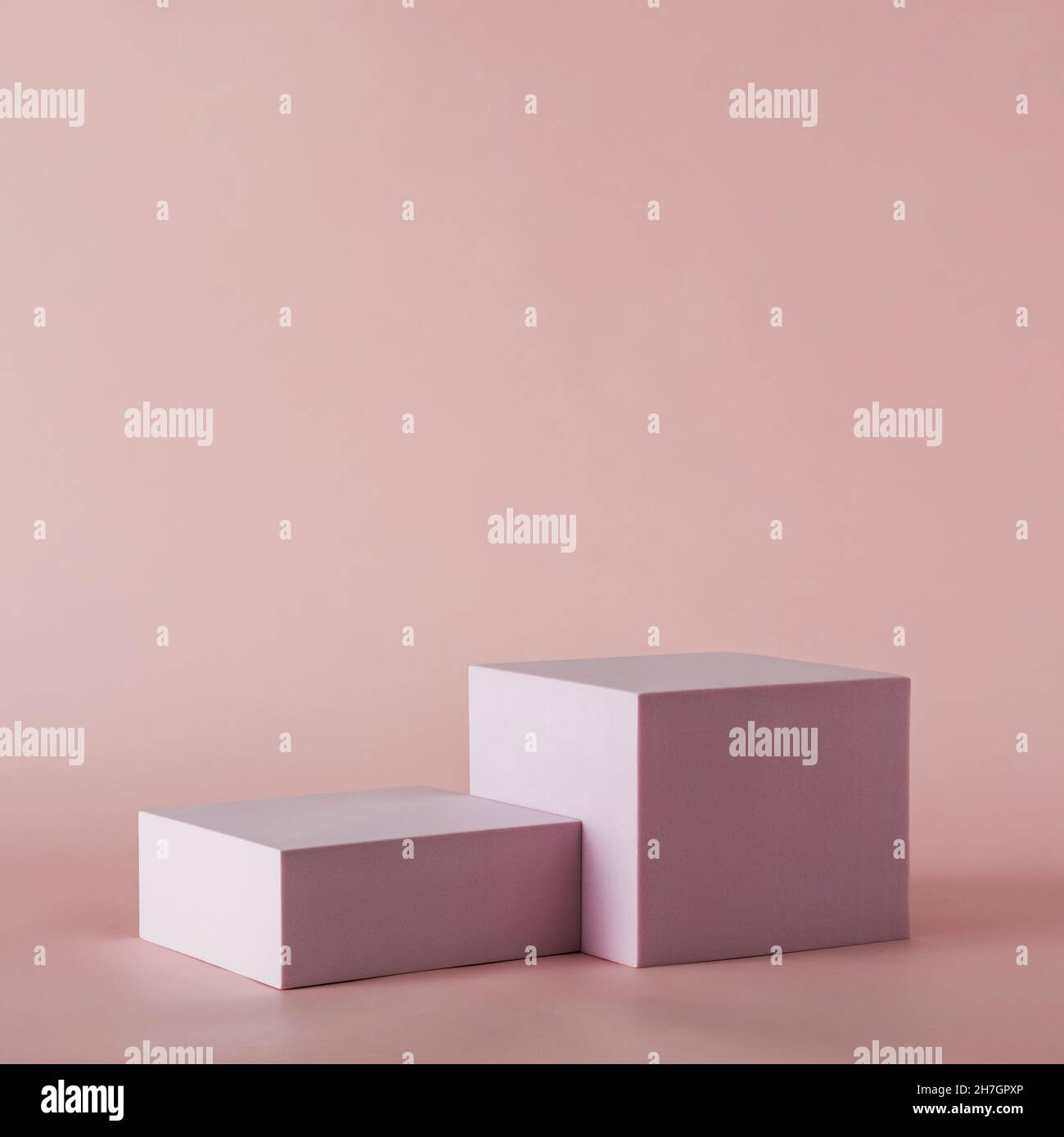 Two simple rectangular shapes of different sizes with shadows, placed ...