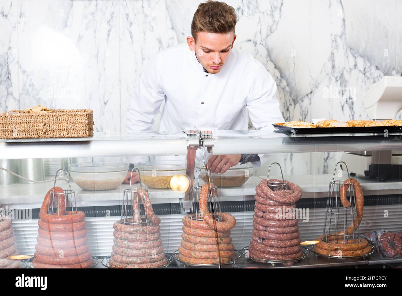 Man chopping meat at meat market hi-res stock photography and images ...