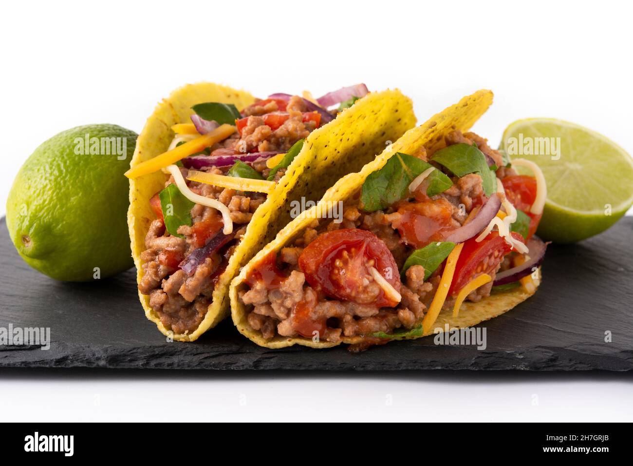 Traditional Mexican tacos with meat and vegetables isolated on white ...