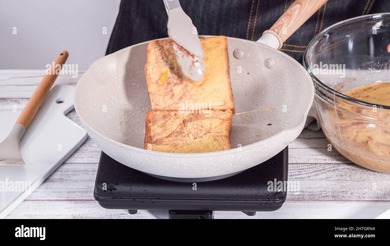 Step by step. Frying french toast in a nonstick frying pan Stock Photo ...