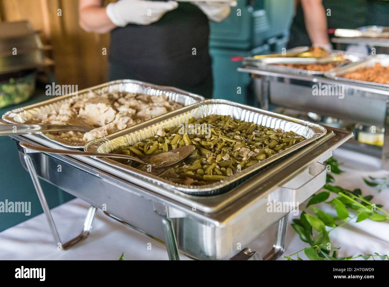 Green beans and mashed potatoes cuisine in a buffet Stock Photo - Alamy