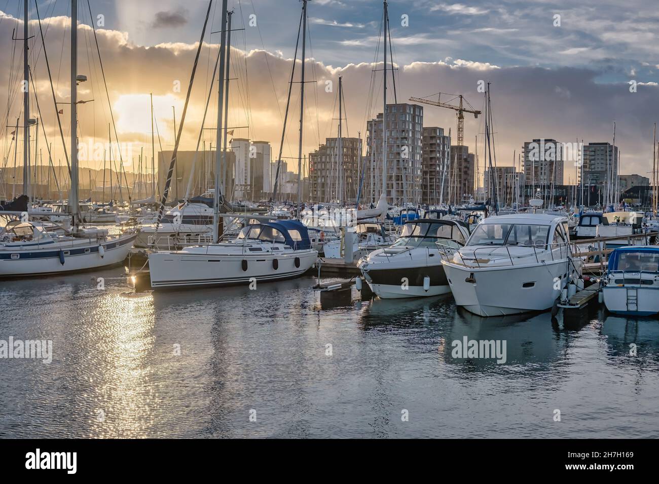 Vejle inner marina harbor with modern apartments and small boats ...