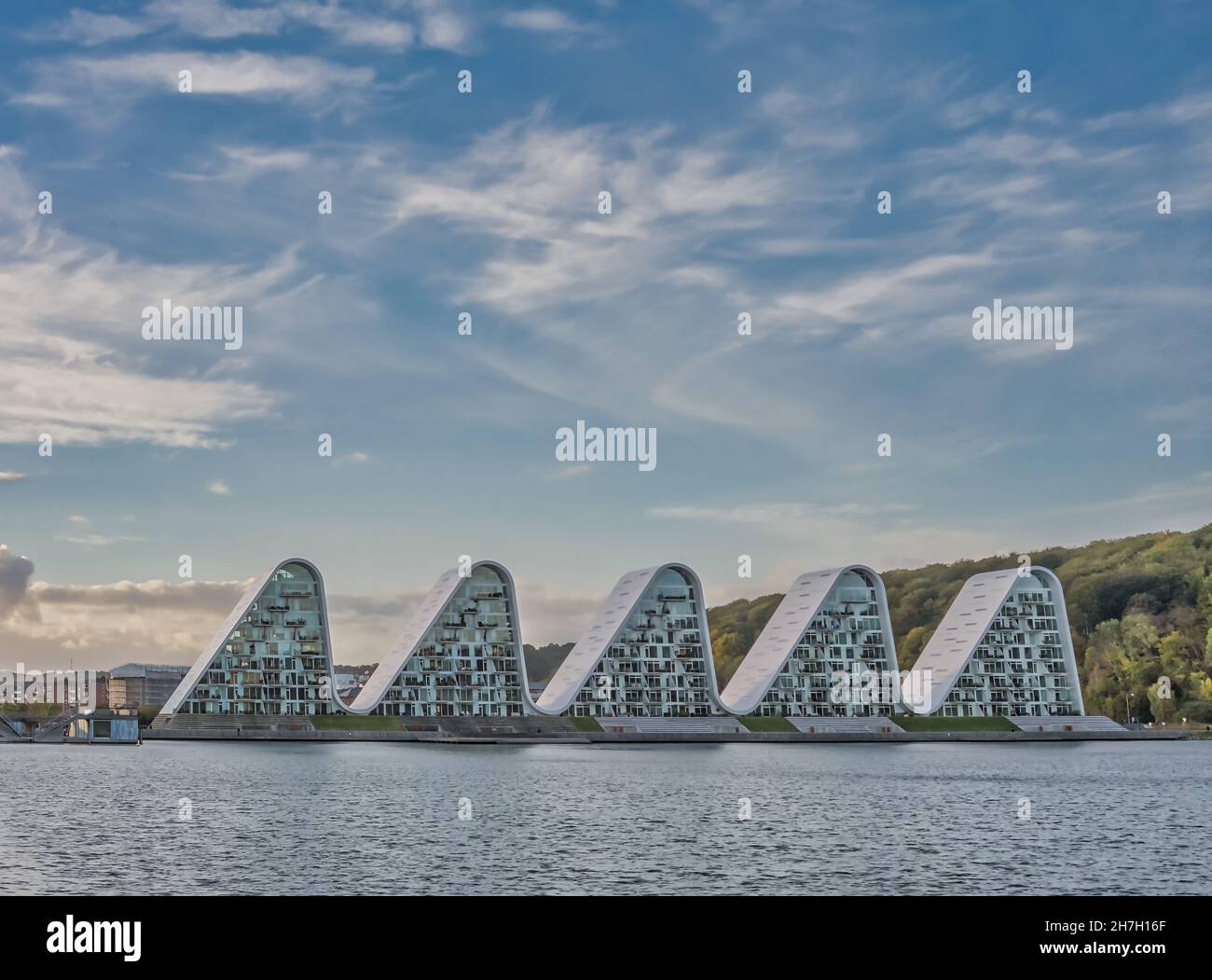 The wave boelgen iconic modern apartments in Vejle, Denmark Stock Photo ...
